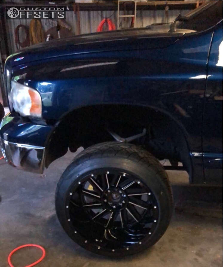 2003 Dodge Ram 1500 with 22x14 -76 American Truxx Striker and 305/45R22 ...