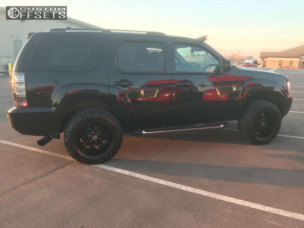 2007 Chevrolet Tahoe with 18x9 -12 Panther Offroad 580 and 275/65R18 ...