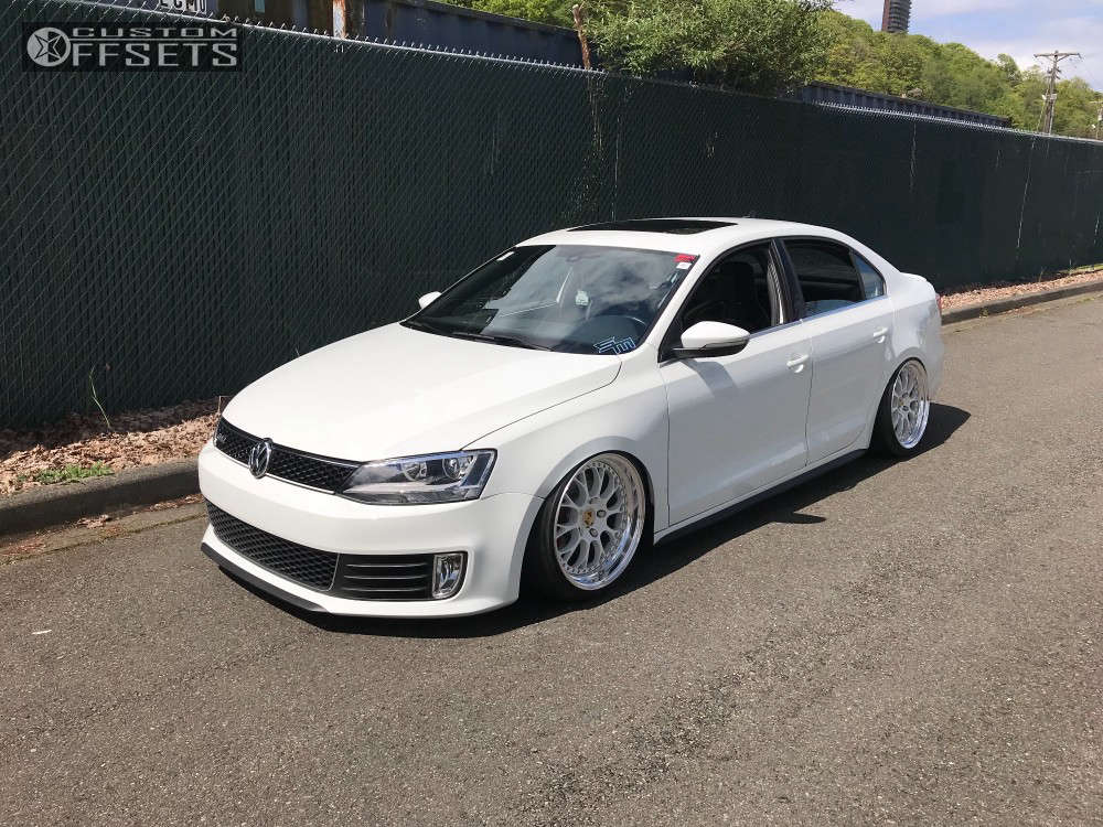 2015 Volkswagen Jetta with 18x10 28 Kinesis K28 and 215/40R18 Hankook ...