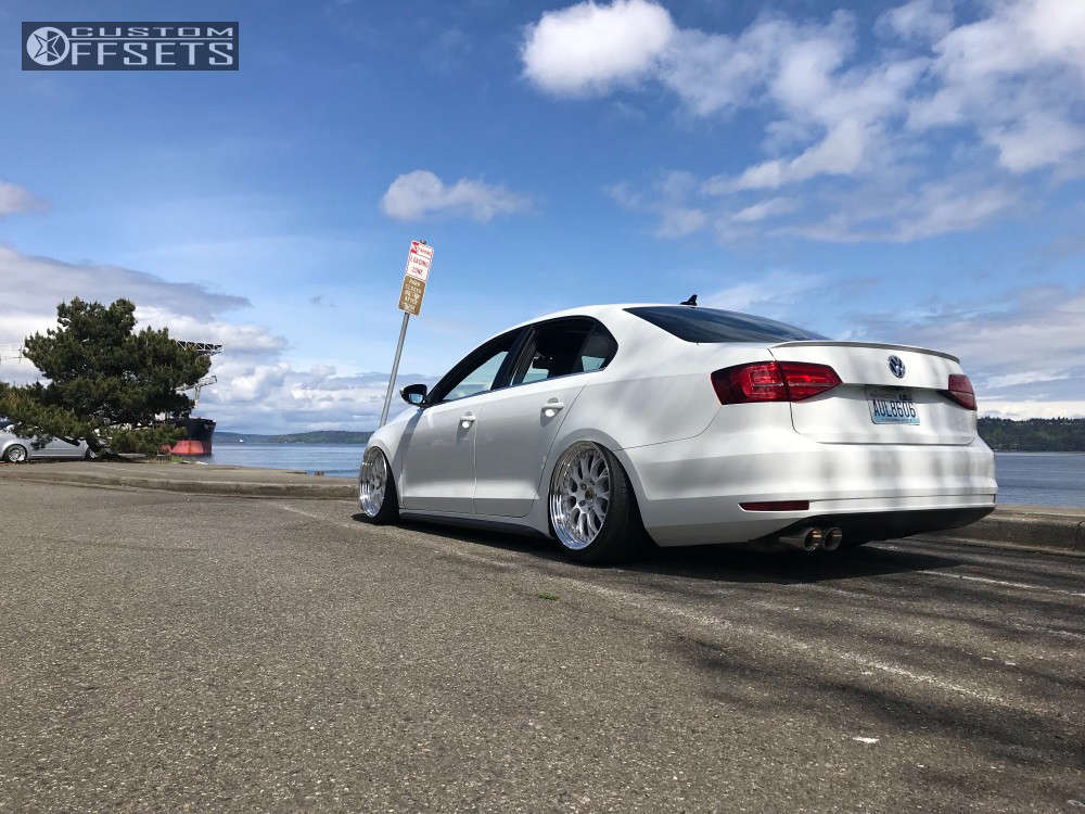 2015 Volkswagen Jetta with 18x10 28 Kinesis K28 and 215/40R18 Hankook ...