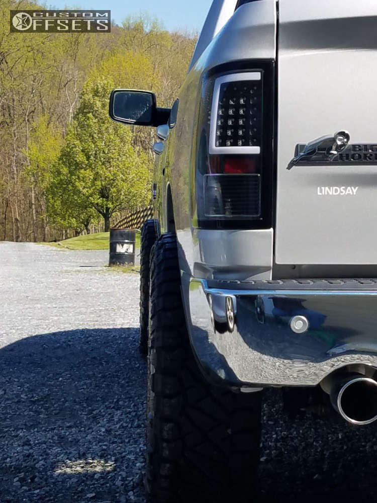 2015 Ram 1500 with 20x10 -19 Ballistic Rage and 35/12.5R20 Nitto Ridge ...