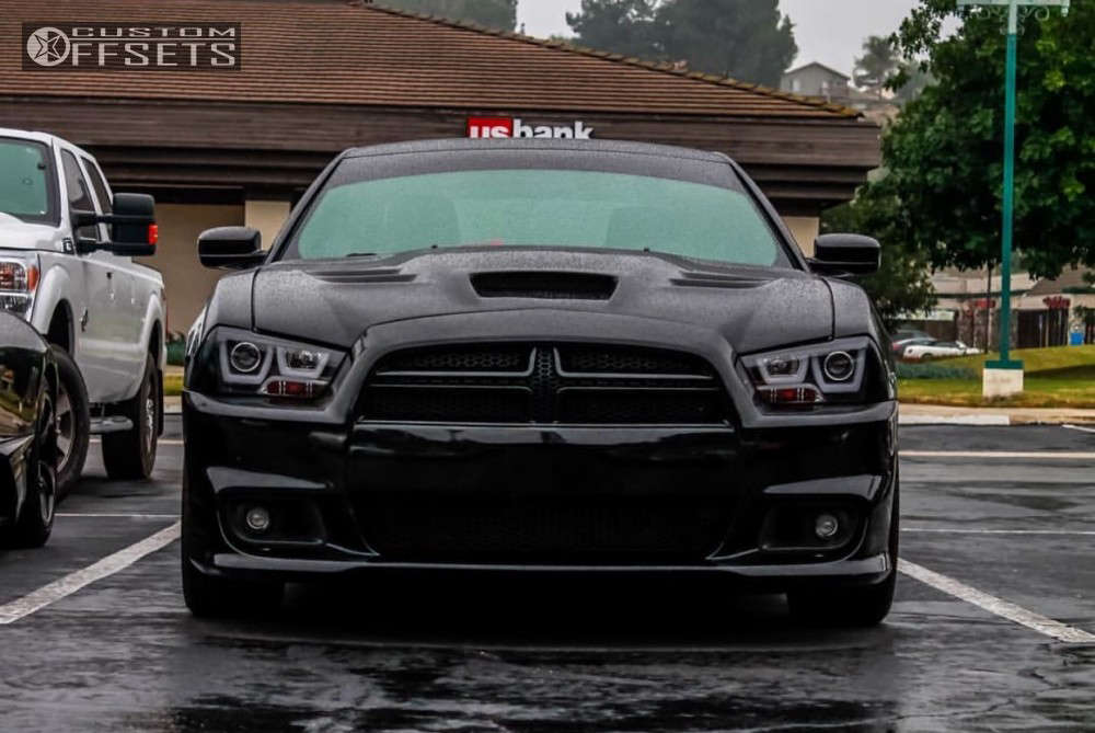 2012 Dodge Charger with 20x8.5 40 Voxx Mga and 245/45R20 Firestone All ...