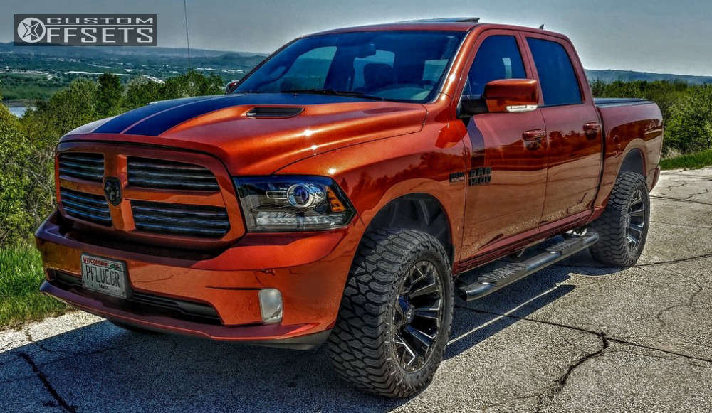 2017 Ram 1500 with 20x10 -18 Fuel Assault and 305/55R20 AMP Terrain ...