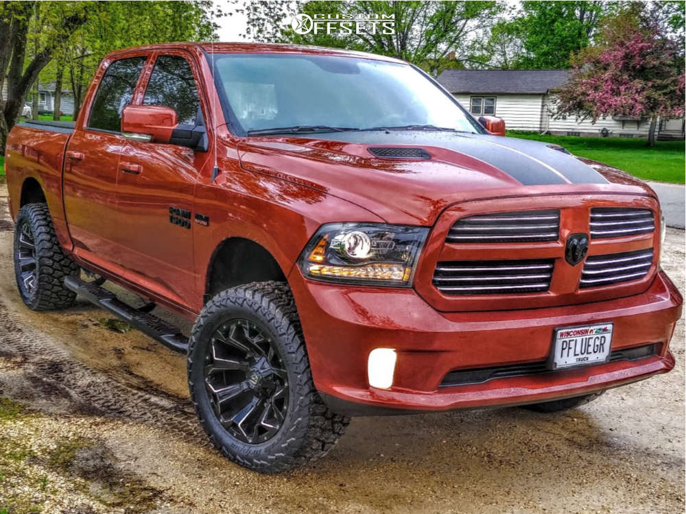 2017 Ram 1500 with 20x10 -18 Fuel Assault and 305/55R20 AMP Terrain ...