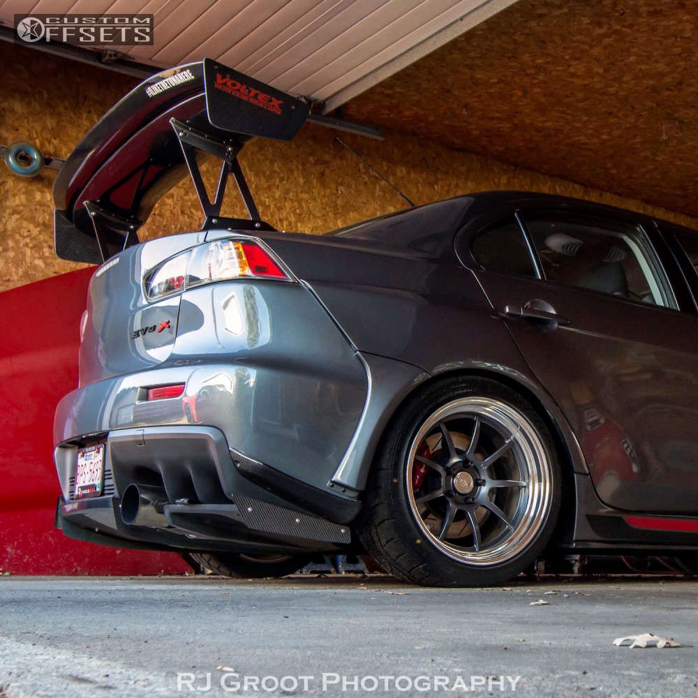 2008 Mitsubishi Lancer with 18x10 6 Motegi MR402 and 265/35R18 Falken ...