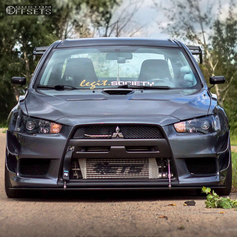 2008 Mitsubishi Lancer with 18x10 6 Motegi MR402 and 265/35R18 Falken ...
