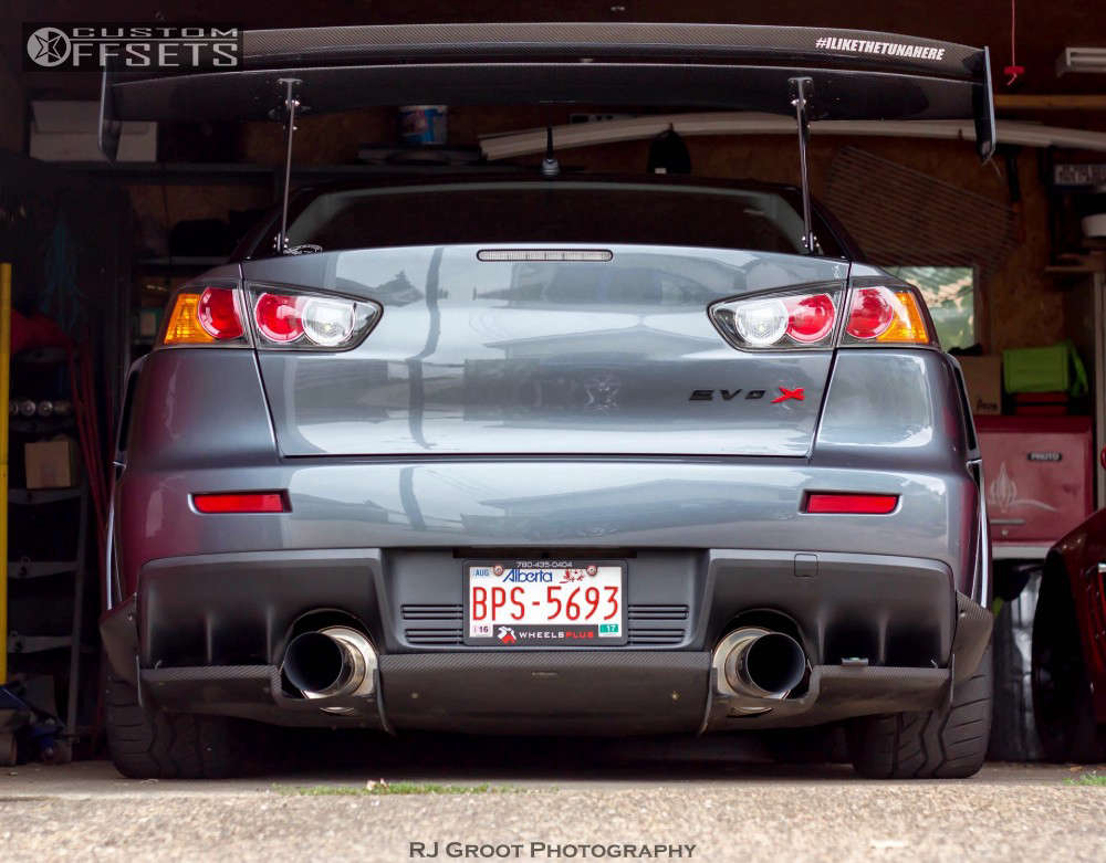 2008 Mitsubishi Lancer with 18x10 6 Motegi MR402 and 265/35R18 Falken ...