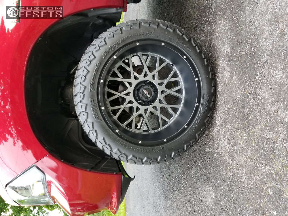 2014 Ram 1500 with 22x12 -51 Vision Rocker and 35/12.5R22 AMP Terrain ...