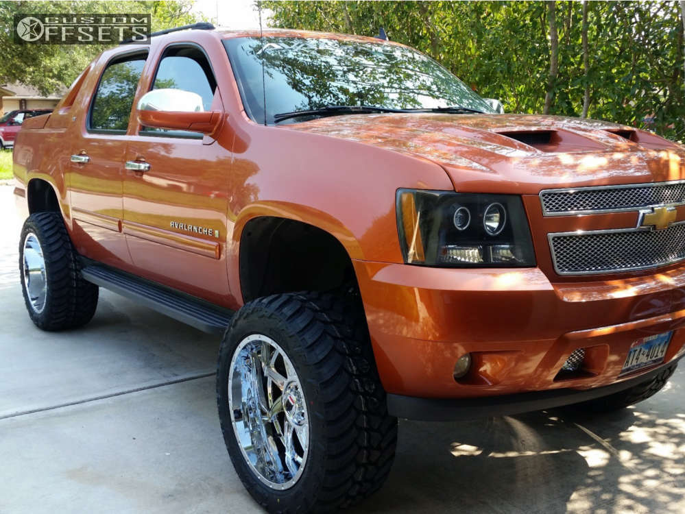 2007 Chevrolet Avalanche with 22x12 -44 American Truxx Vortex and 325 ...