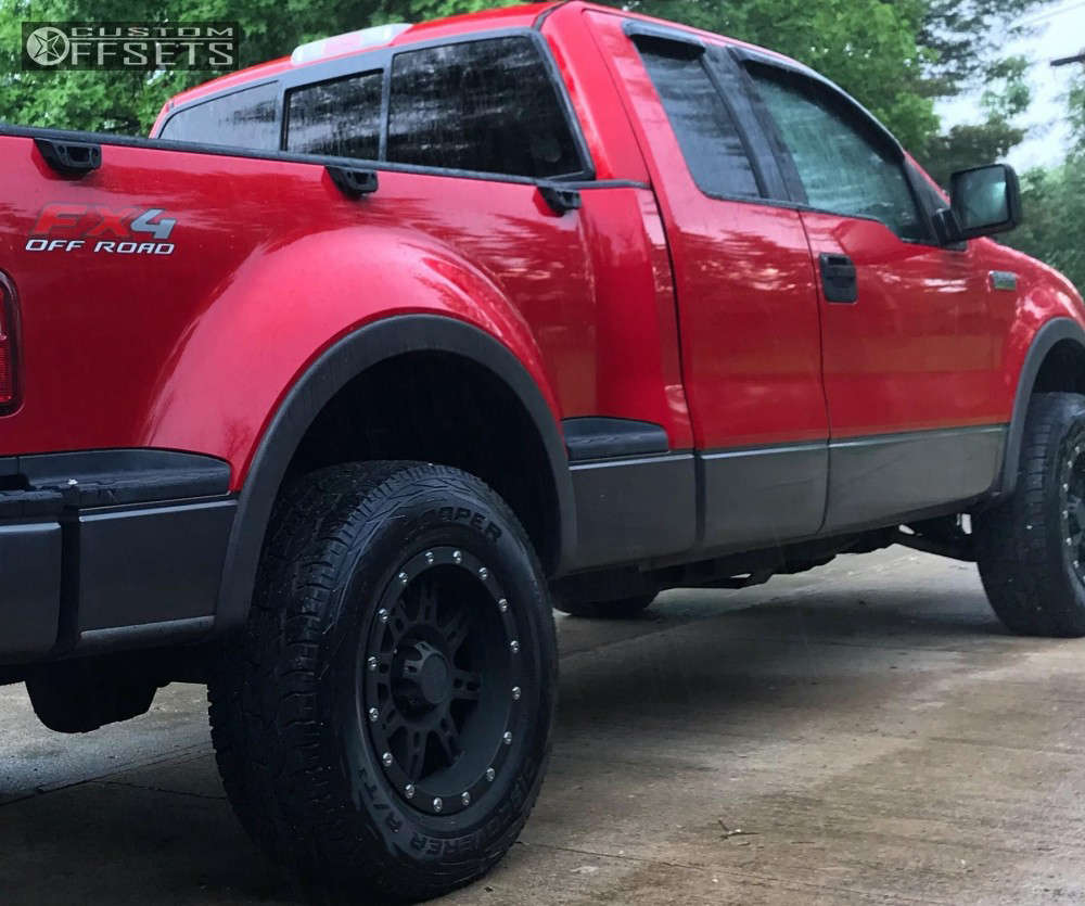 2005 Ford F-150 with 18x9 0 Pro Comp Series 31 and 275/70R18 Cooper ...
