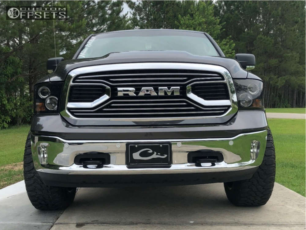 2016 Ram 1500 with 20x12 -44 TIS 544V and 35/12.5R20 Radar Renegade R7 ...