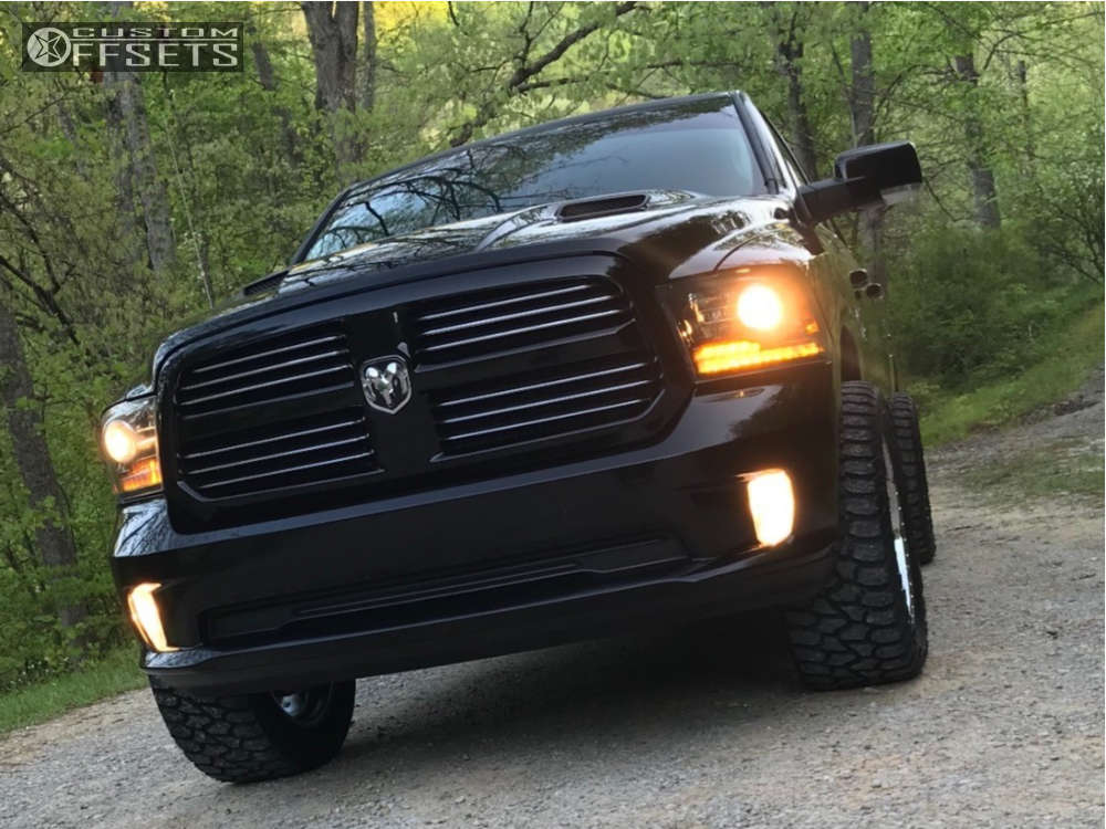 2014 Ram 1500 with 20x10 -12 Helo He791 and 305/55R20 AMP Terrain ...