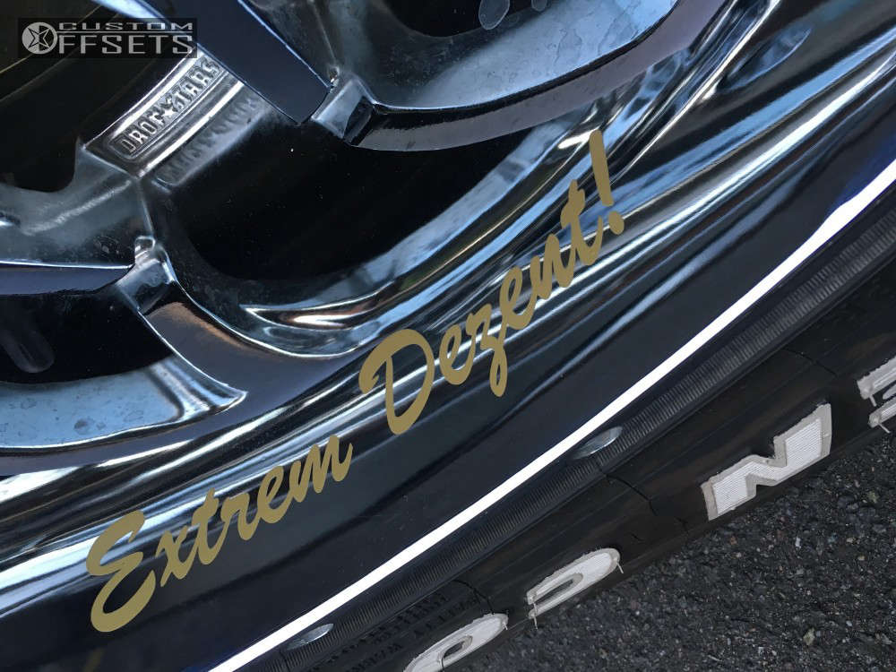 2011 Ram 1500 with 20x10 -19 Dropstars 645v and 35/12.5R20 Toyo Tires ...