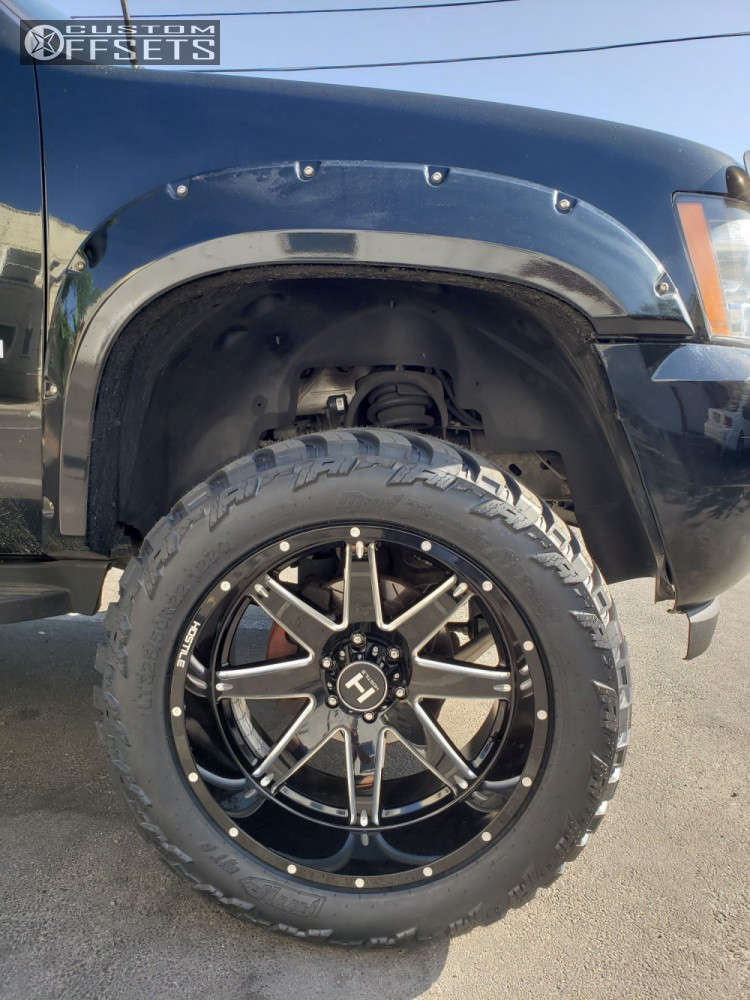 2007 Chevrolet Avalanche with 22x12 -44 Hostile Alpha and 325/50R22 AMP ...