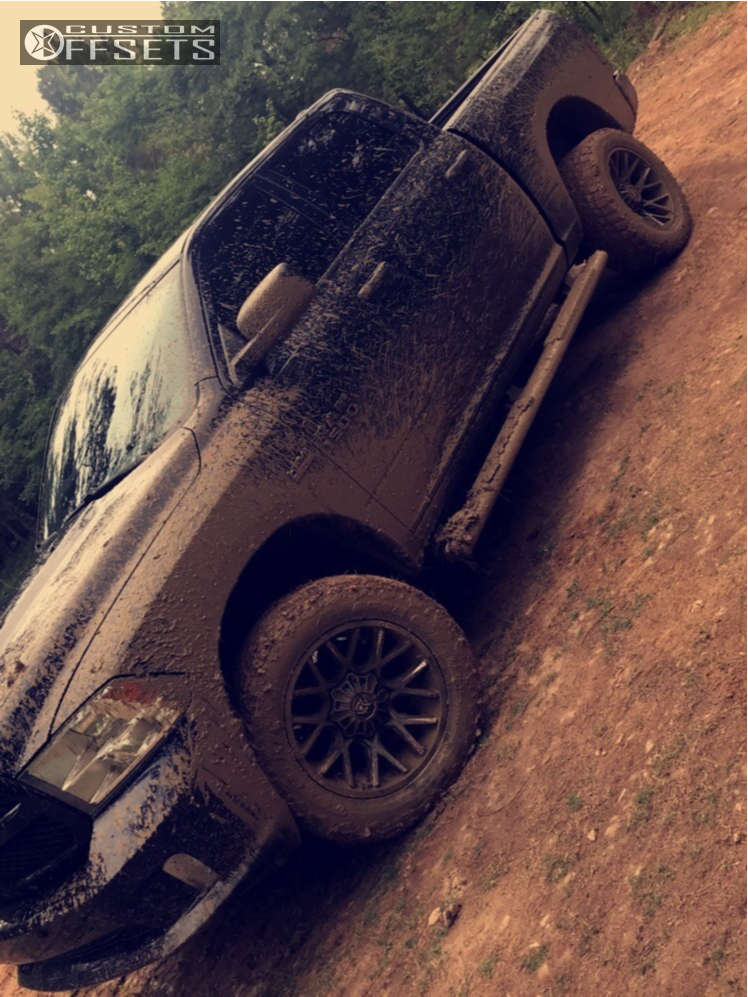 2014 Ram 1500 with 20x10 -25 Dropstars 654bm and 33/12.5R20 Toyo Tires ...