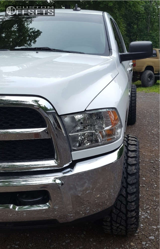 2016 Ram 2500 with 20x10 -24 Moto Metal Mo970 and 35/12.5R20 Cooper ...