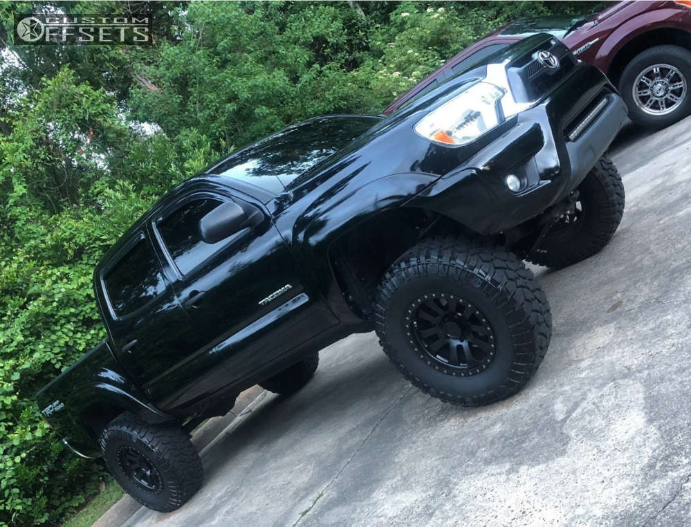 2014 Toyota Tacoma with 17x9 -6 Pro Comp Series 36 and 35/12.5R17 ...