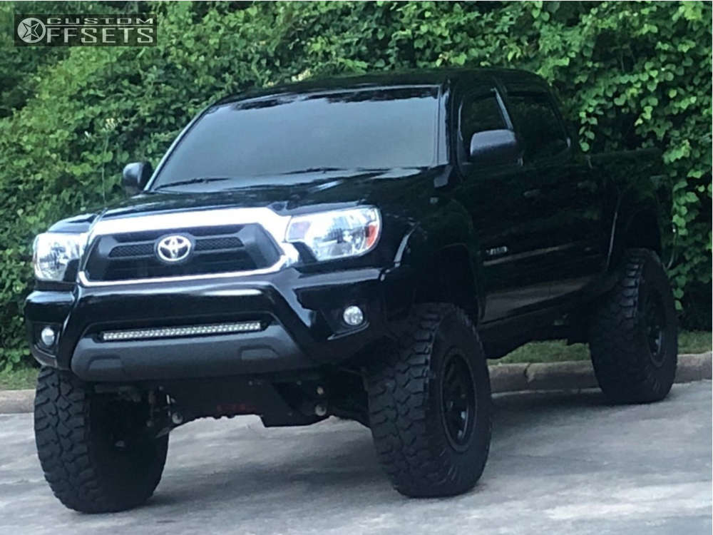 2014 Toyota Tacoma with 17x9 -6 Pro Comp Series 36 and 35/12.5R17 ...