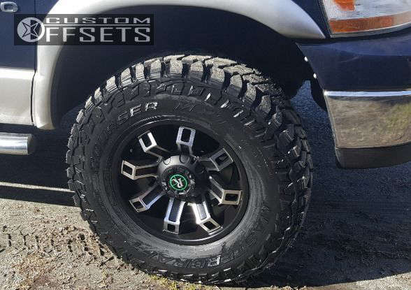 2006 Dodge Ram 1500 with 18x9 Remington Hollow Point and 305/70R18 ...