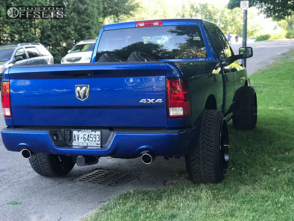 2017 Ram 1500 with 24x14 -76 TIS 544BM and 305/35R24 Atturo Az800 and ...