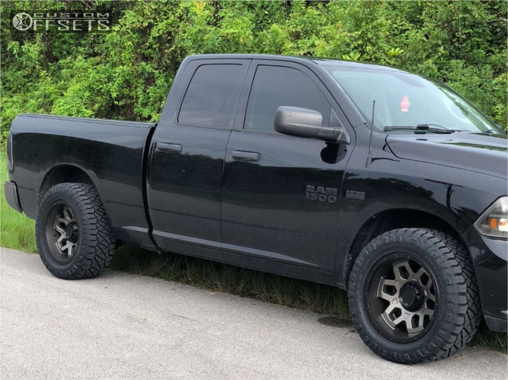 2013 Ram 1500 with 20x10 -25 Ultra Warlock and 33/12.5R20 Nitto Ridge ...