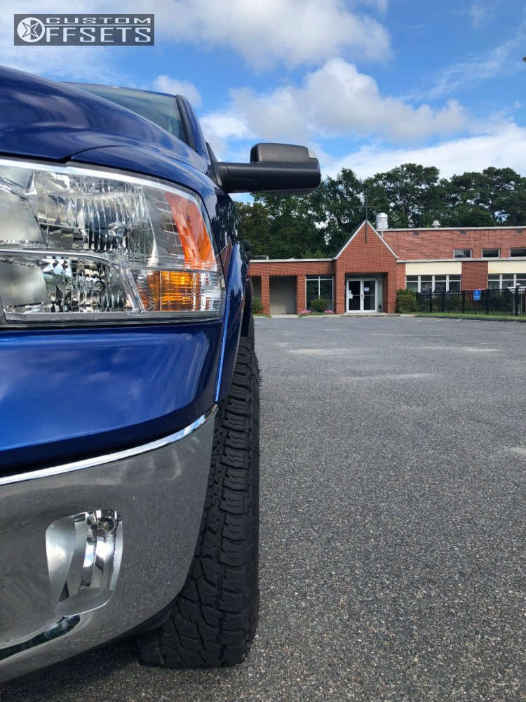 2014 Ram 1500 with 18x9 -12 Red Dirt Road Rd01 and 295/70R18 Nitto ...