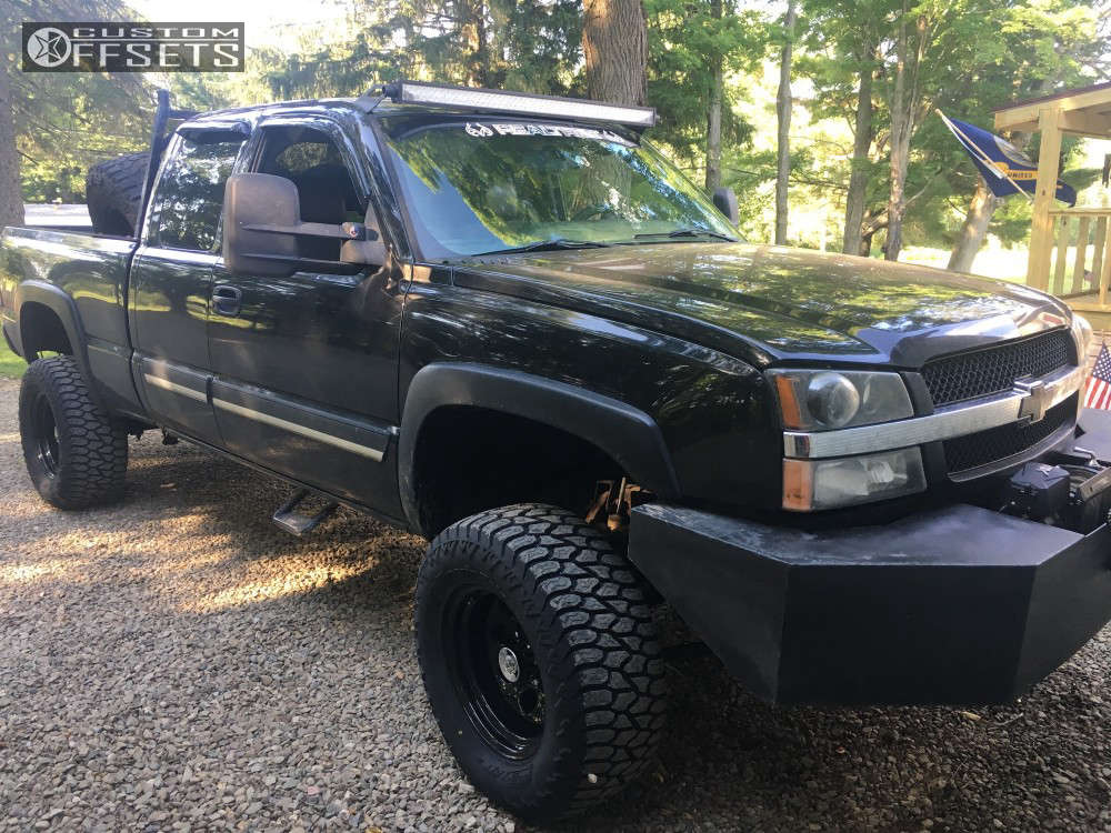2005 Chevrolet Silverado 1500 with 17x9 -38 Pro Comp Series 97 and 305 ...