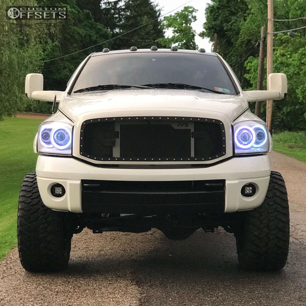2006 Dodge Ram 2500 with 24x14 -76 Hostile Sprocket and 375/40R24 Nitto ...