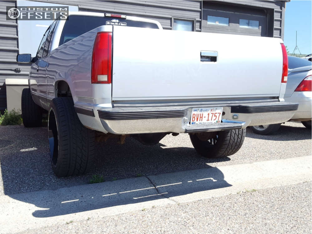 1997 Chevrolet K1500 with 22x12 -44 TIS 544BM and 305/40R22 Cooper Zeon ...
