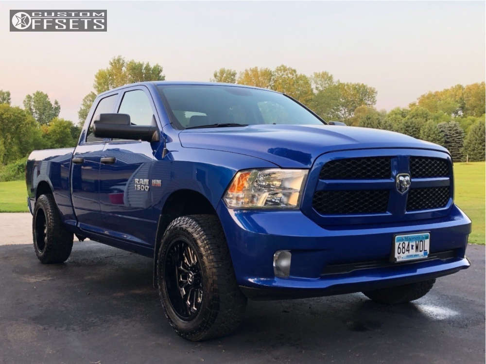 2017 Ram 1500 with 20x10 -19 Hostile Fury and 275/60R20 Falken WildPeak ...