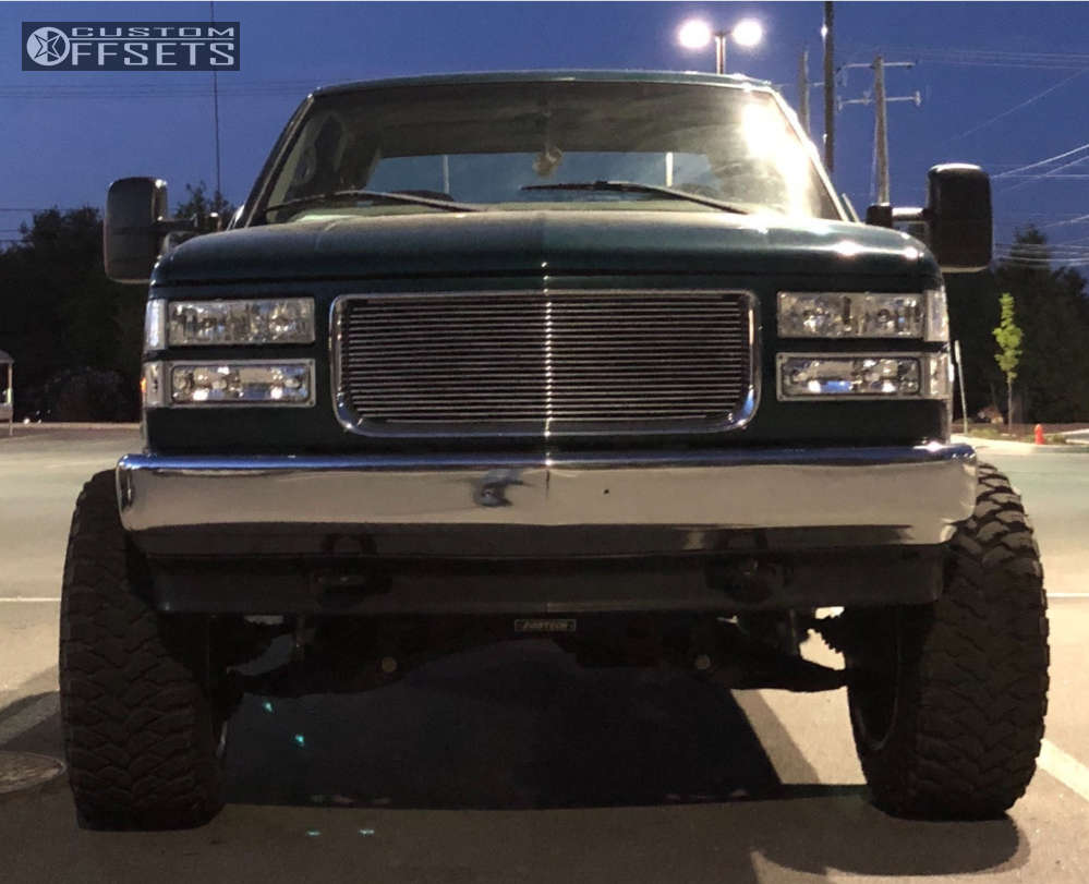 1998 GMC K1500 with 20x12 -44 Hostile Alpha and 35/12.5R20 Comforser ...