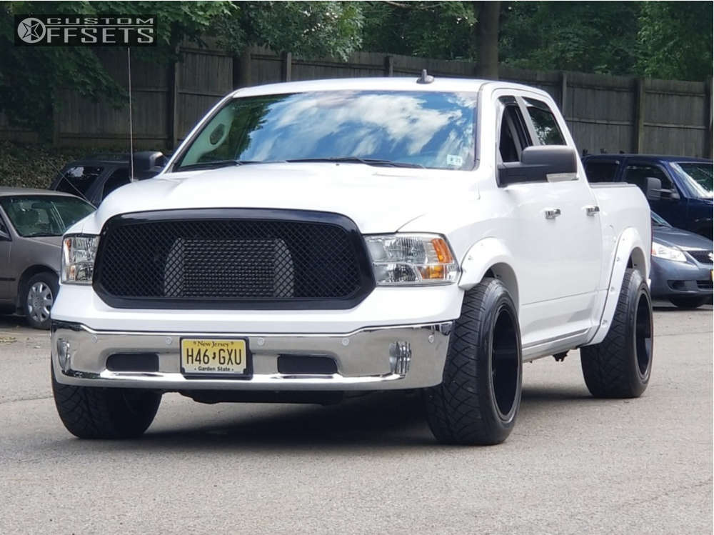 2016 Ram 1500 with 20x12 -44 XD Buck and 305/50R20 Nitto NT420V and ...