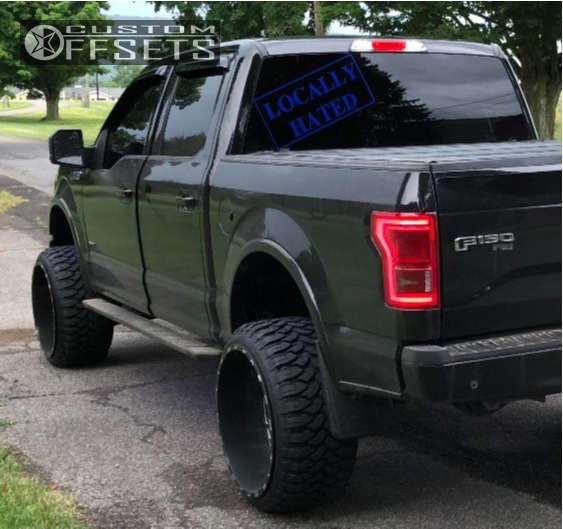 2015 Ford F-150 with 24x14 -76 TIS 544BM and 33/12.5R24 Comforser ...