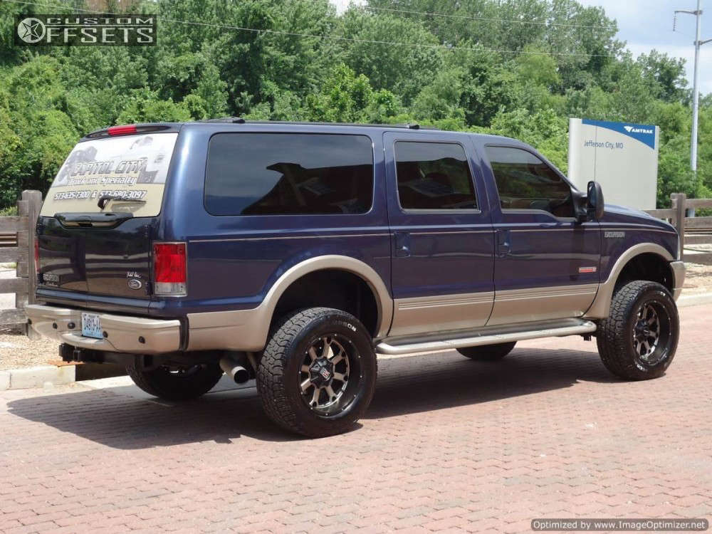2003 Ford Excursion with 20x10 -24 XD Buck and 295/60R20 Mickey ...