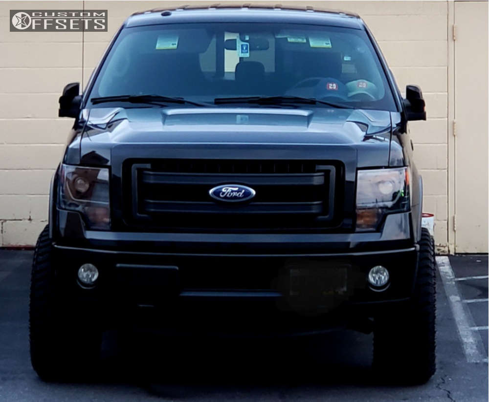 2014 Ford F-150 with 20x10 -25 Toxic Punisher and 305/55R20 Atturo ...