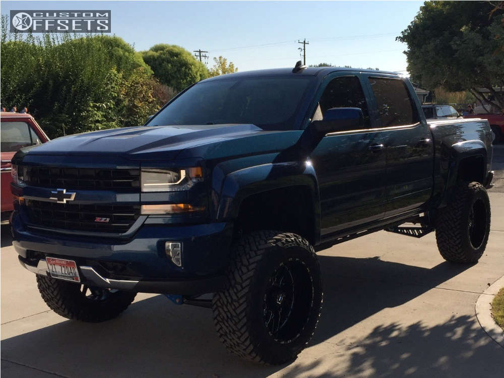2017 Chevrolet Silverado 1500 with 22x12 -44 TIS 544BM and 37/13.5R22 Fuel Mud Gripper and ...