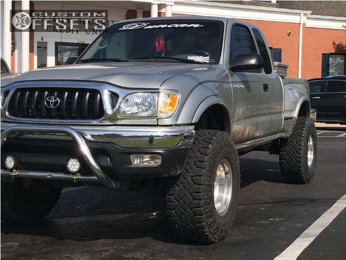 2003 Toyota Tacoma with 15x10 -47 Pro Comp Series 69 and 33/12.5R15 ...