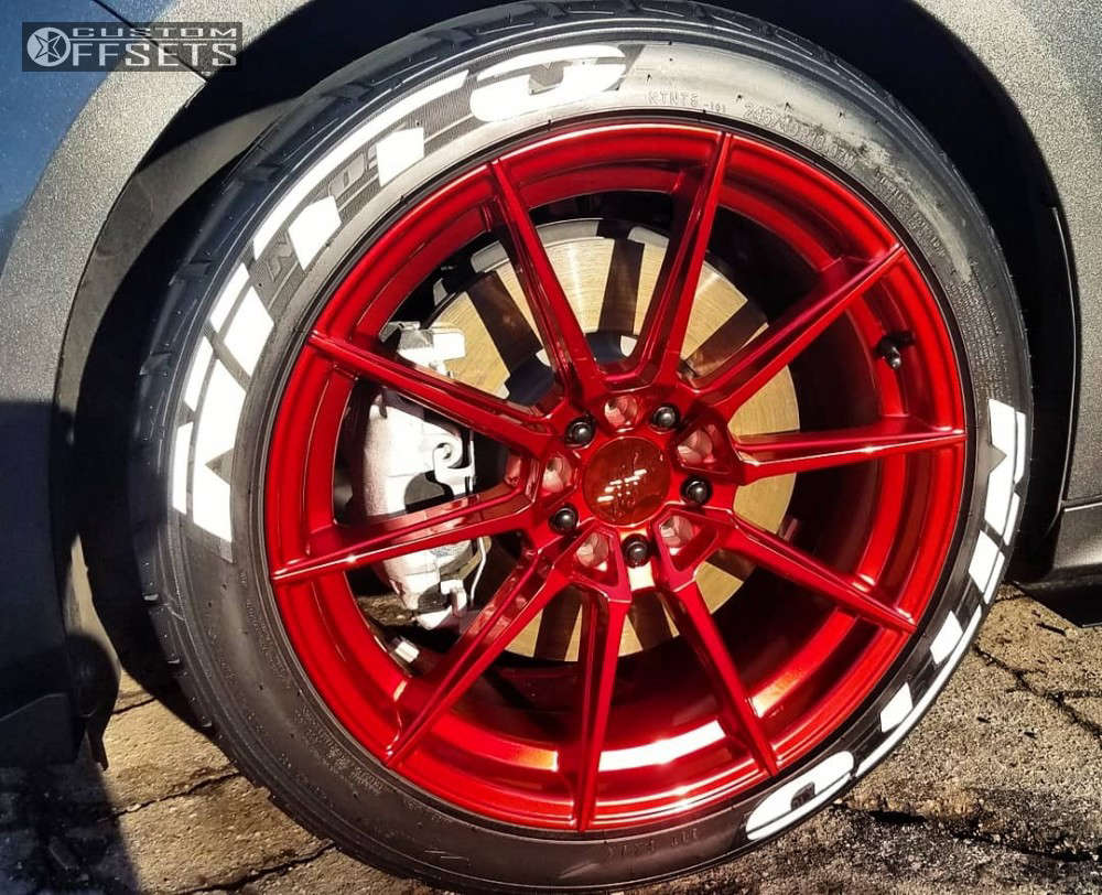 2018 Ford Focus with 18x8.5 35 XXR 567 and 245/40R18 Nitto Nt05 and ...