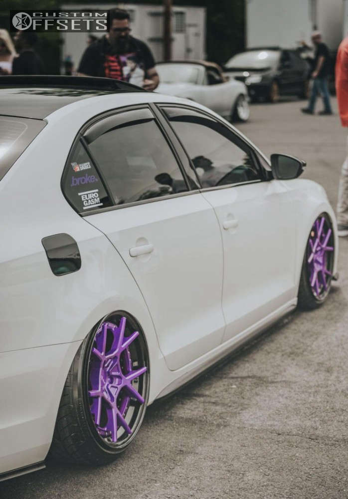 2013 Volkswagen Jetta with 18x9 34 Rotiform Kps and 215/40R18 Nitto Neo ...
