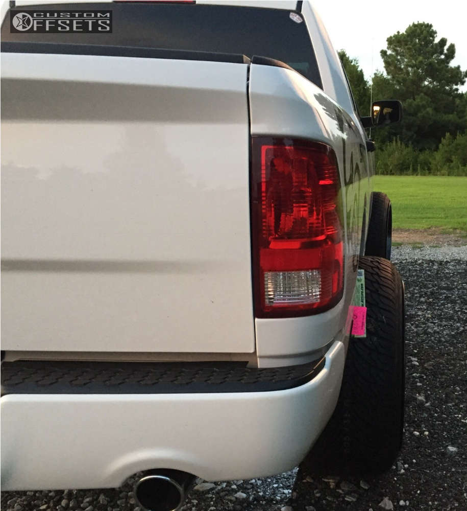 2017 Ram 1500 with 24x14 -76 TIS 544BM and 285/40R24 Atturo Az800 and ...