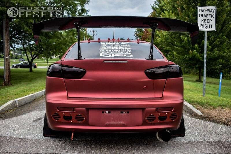 2011 Mitsubishi Lancer with 18x8.5 30 ESR Sr01 and 215/45R18 Hankook ...