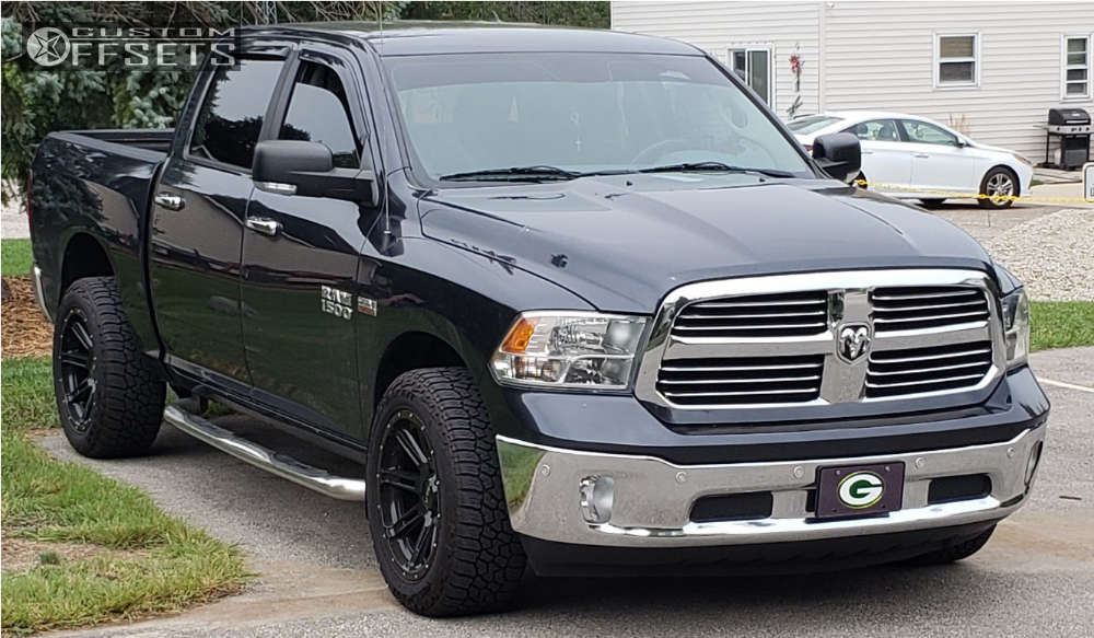 2014 Ram 1500 with 20x10 -24 Helo He900 and 275/50R20 Falken Wildpeak ...