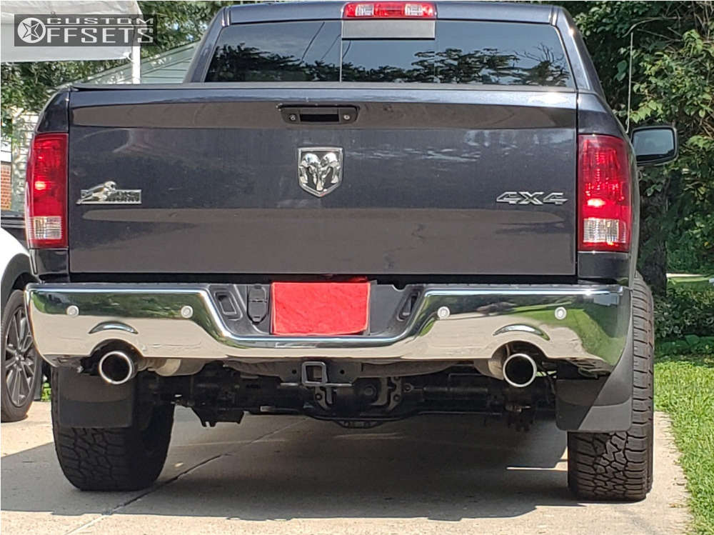 2014 Ram 1500 with 20x10 -24 Helo He900 and 275/50R20 Falken Wildpeak ...