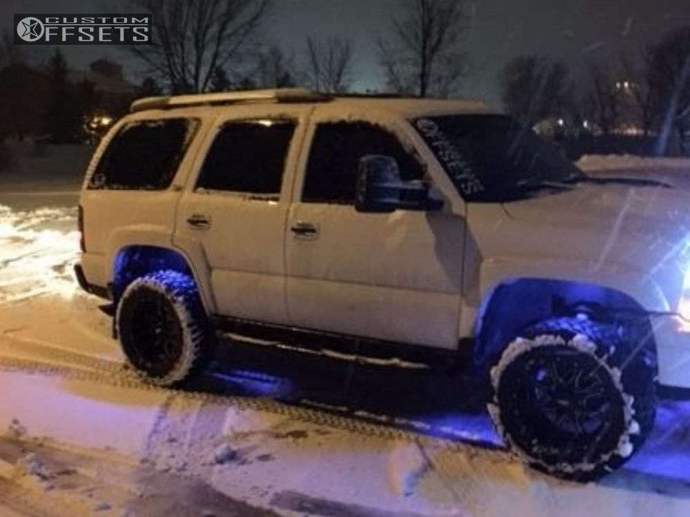 2004 Chevrolet Tahoe with 18x10 -24 Moto Metal MO970 and 305/60R18 ...