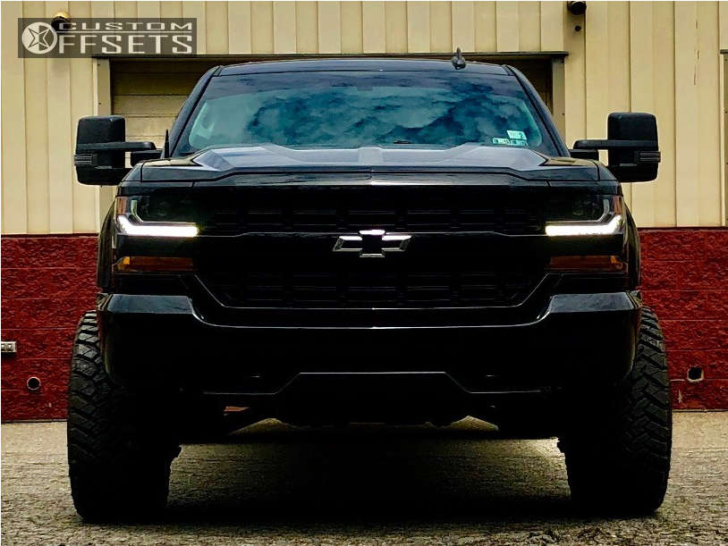 2016 Chevrolet Silverado 1500 with 20x12 -44 Hostile Predator and 33/12 ...