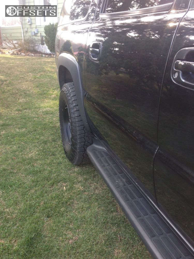 2002 Chevrolet Suburban with 16x8.5 -25 Level 8 Tracker and 285/75R16 ...