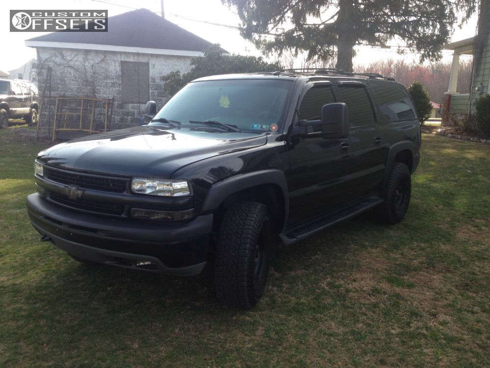 2002 Chevrolet Suburban with 16x8.5 -25 Level 8 Tracker and 285/75R16 ...