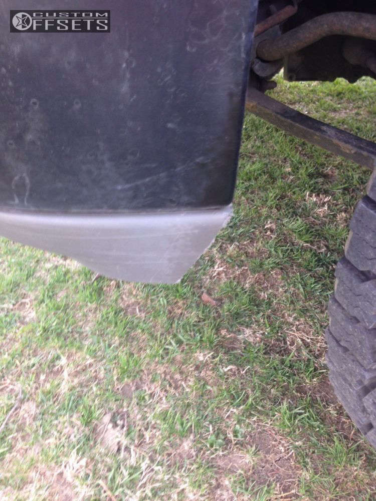 2002 Chevrolet Suburban with 16x8.5 -25 Level 8 Tracker and 285/75R16 ...