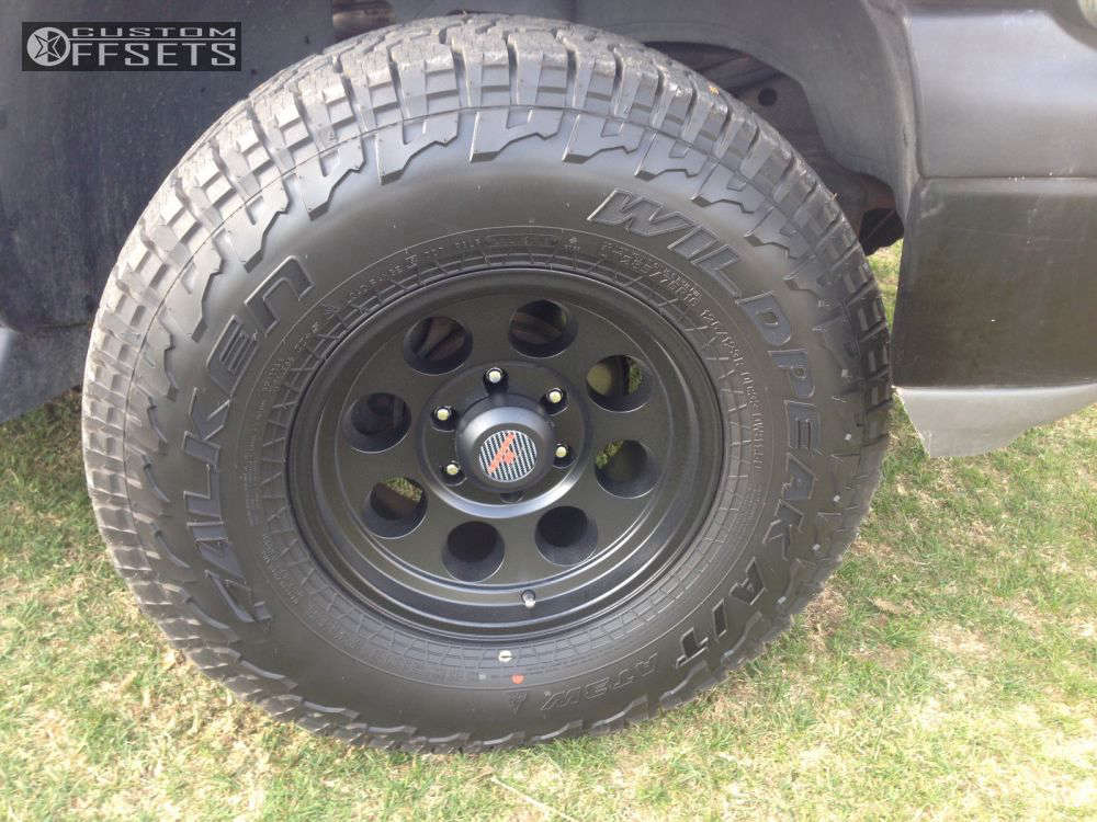 2002 Chevrolet Suburban with 16x8.5 -25 Level 8 Tracker and 285/75R16 ...