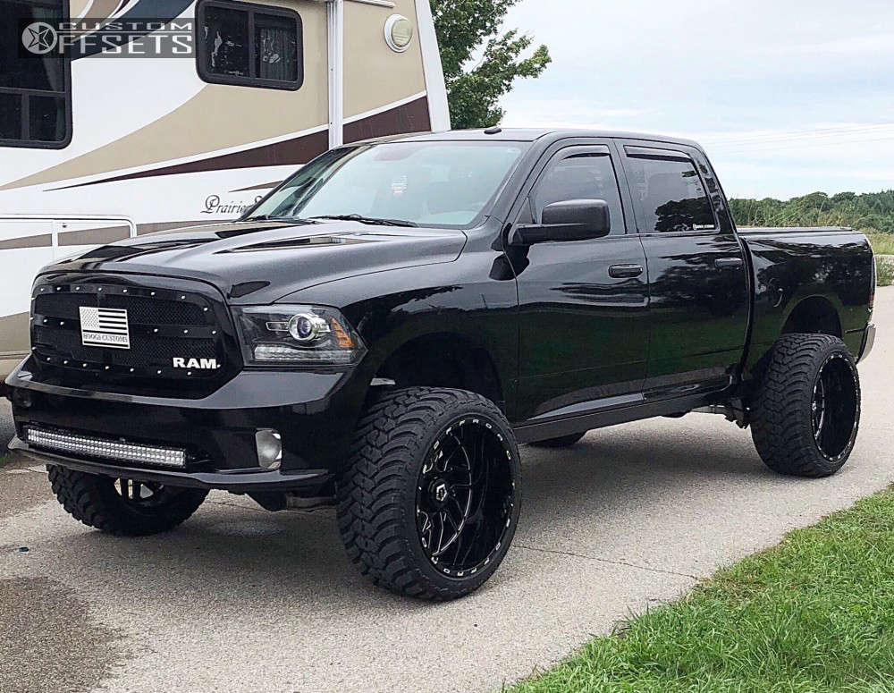 2014 Ram 1500 with 24x14 -76 TIS 544BM and 35/13.5R24 AMP Mud Terrain ...
